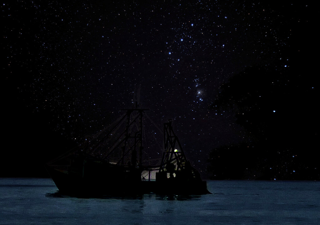 My first upload here, night sky (Orion) and fishing trawler heading out ...